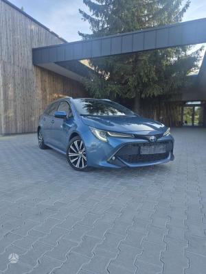 Blue Toyota Corolla 2022 in Siauliai, with an engine capacity of 1.80 L and mileage of 237 thousand km for 14400 €, photo 3 on AUTOMOTO.COM.LV