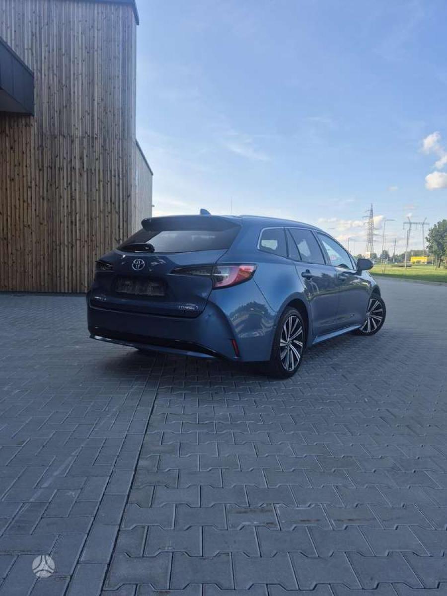 Blue Toyota Corolla 2022 in Siauliai, with an engine capacity of 1.80 L and mileage of 237 thousand km for 14400 €, photo 4 on AUTOMOTO.COM.LV
