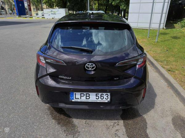 Brown Toyota Corolla 2020 in Vilnius, with an engine capacity of 1.20 L and mileage of 39 thousand km for 15799 €, photo 4 on AUTOMOTO.COM.LV