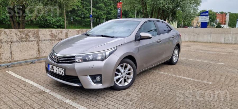 Brown Toyota Corolla 2014 in Riga, with an engine capacity of 1.60 L and mileage of 225 thousand km for 6200 €, photo 1 on AUTOMOTO.COM.LV