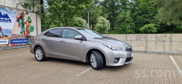Brown Toyota Corolla 2014 in Riga, with an engine capacity of 1.60 L and mileage of 225 thousand km for 6200 €, photo 4 on AUTOMOTO.COM.LV