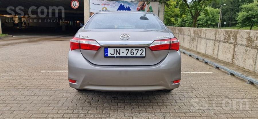 Brown Toyota Corolla 2014 in Riga, with an engine capacity of 1.60 L and mileage of 225 thousand km for 6200 €, photo 12 on AUTOMOTO.COM.LV
