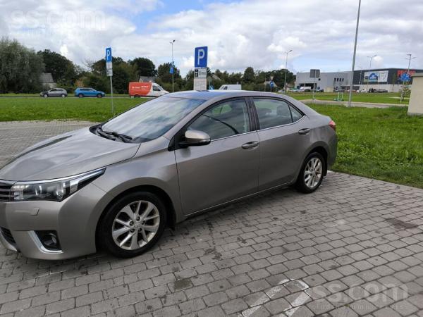 Brown Toyota Corolla 2014 in Riga, with an engine capacity of 1.60 L and mileage of 217 thousand km for 6100 €, photo 2 on AUTOMOTO.COM.LV