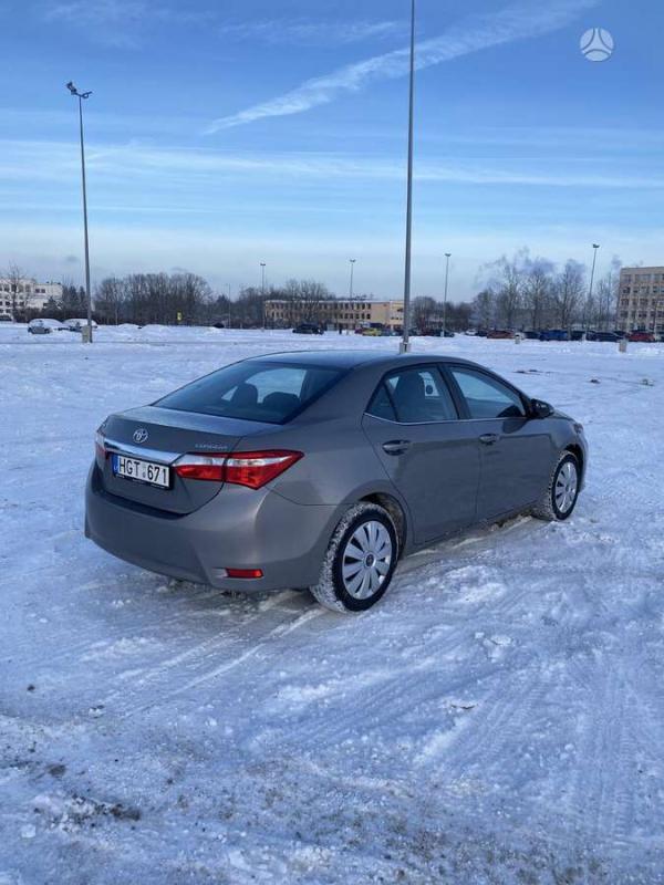 Brown Toyota Corolla 2014 in Kaunas, with an engine capacity of 1.60 L and mileage of 100 thousand km for 7850 €, photo 6 on AUTOMOTO.COM.LV