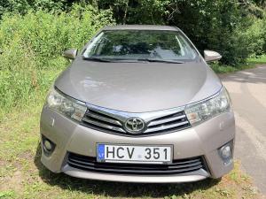 Brown Toyota Corolla 2014 in Vilnius, with an engine capacity of 1.60 L and mileage of 145 thousand km for 7500 €, photo  on AUTOMOTO.COM.LV
