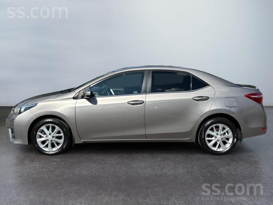Brown Toyota Corolla 2014 in Riga, with an engine capacity of 1.60 L and mileage of 194 thousand km for 8230 €, photo 3 on AUTOMOTO.COM.LV