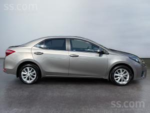 Brown Toyota Corolla 2014 in Riga, with an engine capacity of 1.60 L and mileage of 194 thousand km for 8230 €, photo 6 on AUTOMOTO.COM.LV
