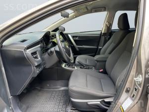 Brown Toyota Corolla 2014 in Riga, with an engine capacity of 1.60 L and mileage of 194 thousand km for 8230 €, photo 9 on AUTOMOTO.COM.LV
