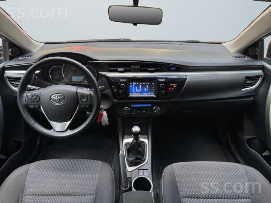 Brown Toyota Corolla 2014 in Riga, with an engine capacity of 1.60 L and mileage of 194 thousand km for 8230 €, photo 10 on AUTOMOTO.COM.LV