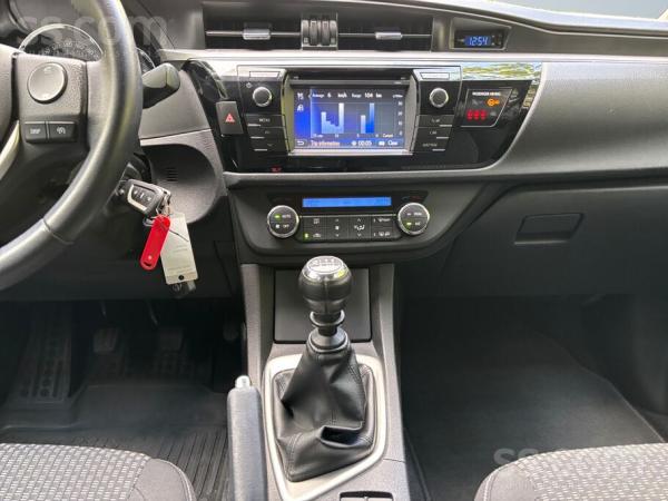 Brown Toyota Corolla 2014 in Riga, with an engine capacity of 1.60 L and mileage of 194 thousand km for 8230 €, photo 11 on AUTOMOTO.COM.LV