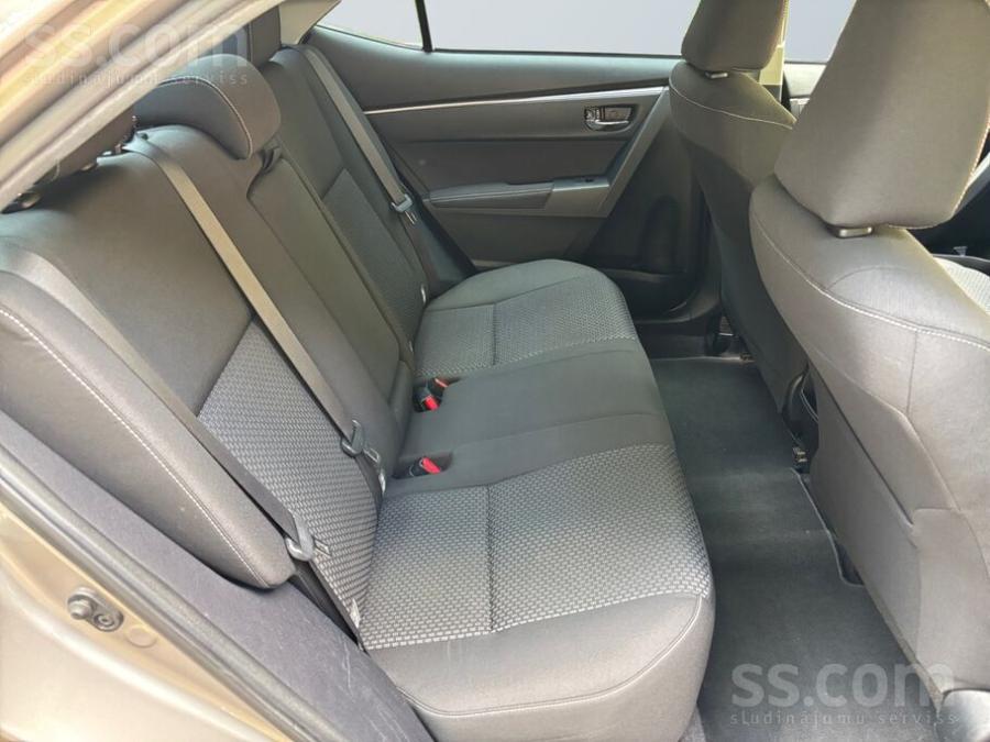 Brown Toyota Corolla 2014 in Riga, with an engine capacity of 1.60 L and mileage of 194 thousand km for 8230 €, photo 13 on AUTOMOTO.COM.LV