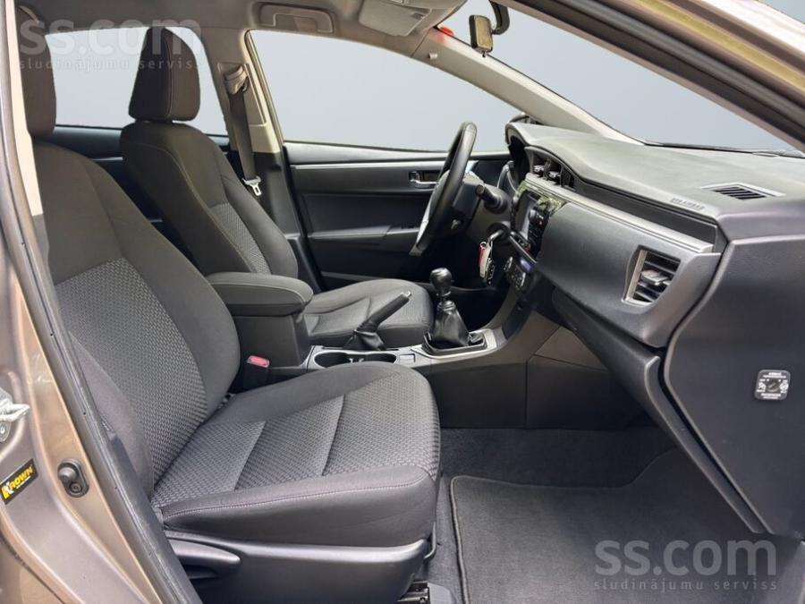 Brown Toyota Corolla 2014 in Riga, with an engine capacity of 1.60 L and mileage of 194 thousand km for 8230 €, photo 15 on AUTOMOTO.COM.LV