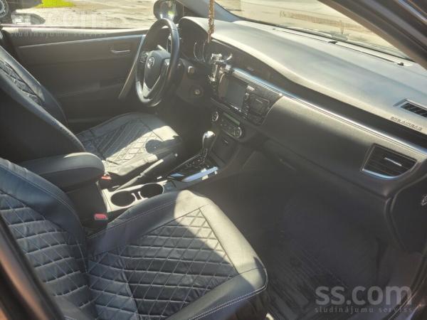 Brown Toyota Corolla 2015 in Riga, with an engine capacity of 1.60 L and mileage of 123 thousand km for 9500 €, photo 9 on AUTOMOTO.COM.LV