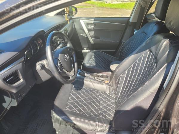 Brown Toyota Corolla 2015 in Riga, with an engine capacity of 1.60 L and mileage of 123 thousand km for 9500 €, photo 10 on AUTOMOTO.COM.LV