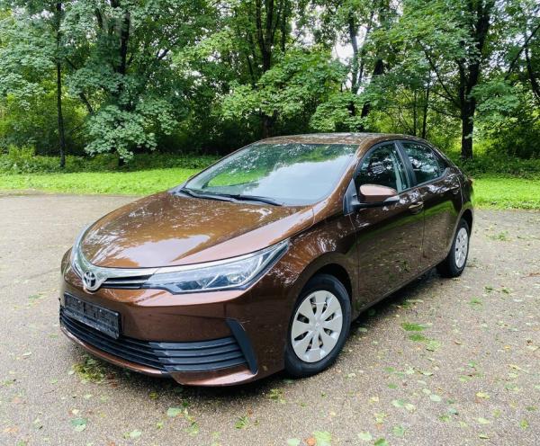 Brown Toyota Corolla 2017 in Riga, with an engine capacity of 1.40 L and mileage of 0 thousand km for 6999 €, photo 3 on AUTOMOTO.COM.LV