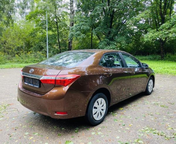 Brown Toyota Corolla 2017 in Riga, with an engine capacity of 1.40 L and mileage of 0 thousand km for 6999 €, photo 6 on AUTOMOTO.COM.LV