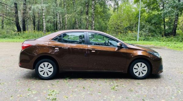 Brown Toyota Corolla 2017 in Riga, with an engine capacity of 1.40 L and mileage of 0 thousand km for 6999 €, photo 7 on AUTOMOTO.COM.LV