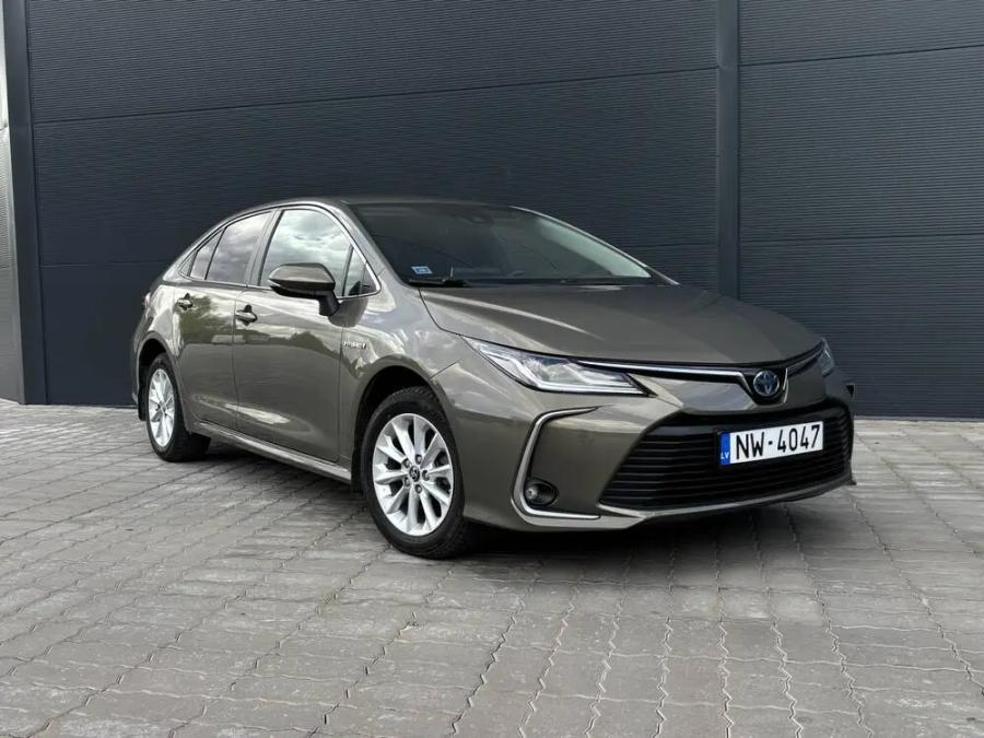 Brown Toyota Corolla 2019 in Riga, with an engine capacity of 1.80 L and mileage of 124 thousand km for 16850 €, photo 6 on AUTOMOTO.COM.LV