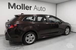 Brown Toyota Corolla 2021 in Vilnius, with an engine capacity of 1.20 L and mileage of 102 thousand km for 13900 €, photo 4 on AUTOMOTO.COM.LV