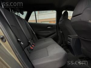 Brown Toyota Corolla 2022 in Riga, with an engine capacity of 1.80 L and mileage of 146 thousand km for 16900 €, photo 13 on AUTOMOTO.COM.LV
