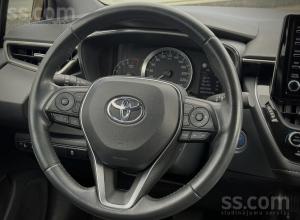 Brown Toyota Corolla 2022 in Riga, with an engine capacity of 1.80 L and mileage of 146 thousand km for 16900 €, photo 15 on AUTOMOTO.COM.LV