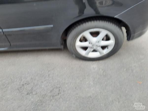 Toyota Corolla 2006 in Vilnius, with an engine capacity of 2.00 L and mileage of 207 thousand km for 1390 €, photo 5 on AUTOMOTO.COM.LV