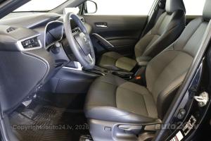Black Toyota Corolla Cross 2024 in Tallinn, with an engine capacity of 1.99 L and mileage of 10 thousand km for 36500 €, photo 12 on AUTOMOTO.COM.LV