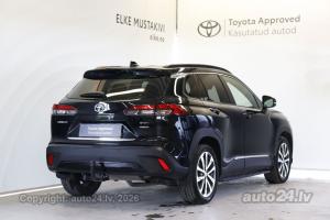 Black Toyota Corolla Cross 2024 in Tallinn, with an engine capacity of 1.99 L and mileage of 45 thousand km for 34900 €, photo 3 on AUTOMOTO.COM.LV