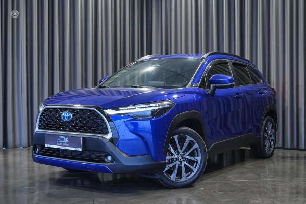 Zils Toyota Corolla Cross 2024 Marijampole, ar dzinēja tilpumu 1.80 L un nobraukumu 74 tūkst. km par 27450 €, foto 2 vietnē AUTOMOTO.COM.LV
