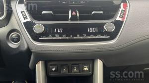Grey Toyota Corolla Cross 2023 in Riga, with an engine capacity of 2.00 L and mileage of 58 thousand km for 27450 €, photo 13 on AUTOMOTO.COM.LV