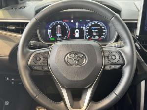 Grey Toyota Corolla Cross 2023 in Siauliai, with an engine capacity of 1.99 L and mileage of 26 thousand km for 32900 €, photo 19 on AUTOMOTO.COM.LV