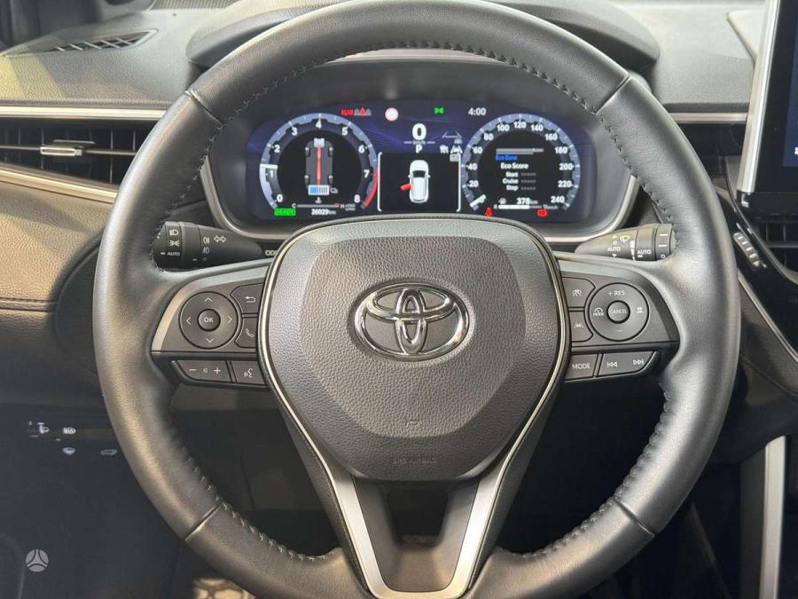 Grey Toyota Corolla Cross 2023 in Siauliai, with an engine capacity of 1.99 L and mileage of 26 thousand km for 32900 €, photo 19 on AUTOMOTO.COM.LV
