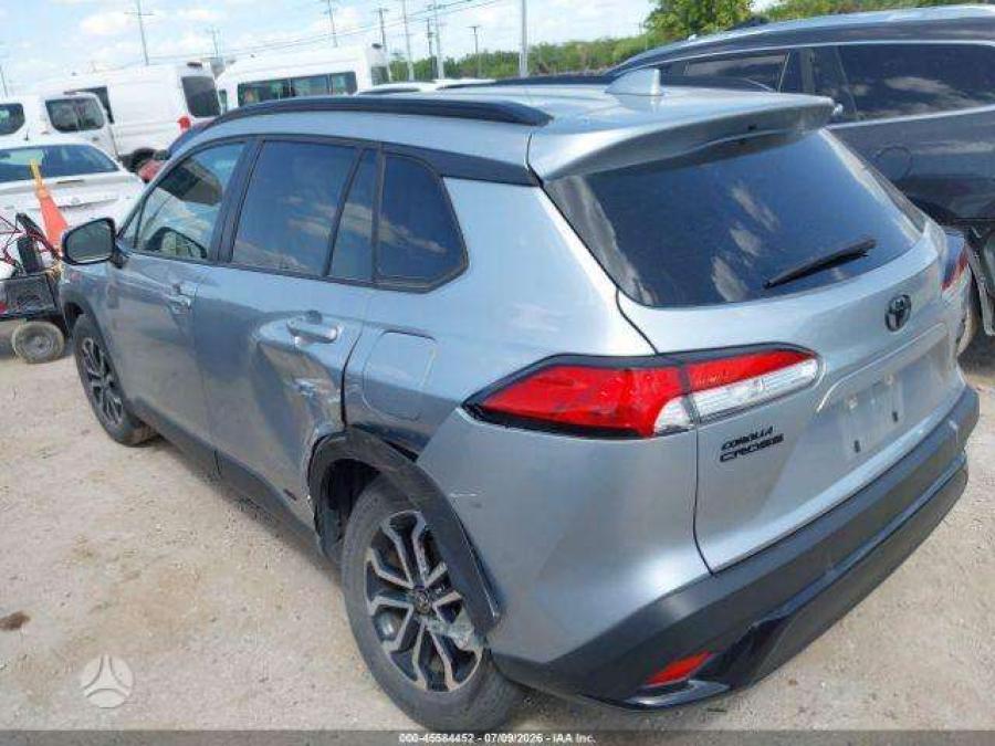 Grey Toyota Corolla Cross 2023 in Klaipeda, with an engine capacity of 2.00 L and mileage of 67 thousand km for 11000 €, photo 4 on AUTOMOTO.COM.LV