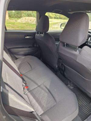 Grey Toyota Corolla Cross 2024 in Jonava, with an engine capacity of 2.00 L and mileage of 64 thousand km for 24600 €, photo 14 on AUTOMOTO.COM.LV