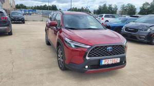 Sarkans Toyota Corolla Cross 2024 Šauļi, ar dzinēja tilpumu 1.99 L un nobraukumu 131 tūkst. km par 23900 €, foto 5 vietnē AUTOMOTO.COM.LV