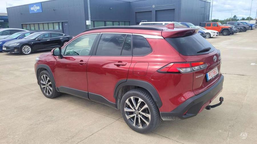 Sarkans Toyota Corolla Cross 2024 Šauļi, ar dzinēja tilpumu 1.99 L un nobraukumu 131 tūkst. km par 23900 €, foto 8 vietnē AUTOMOTO.COM.LV