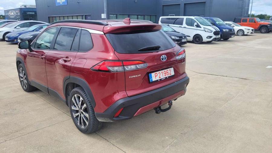 Sarkans Toyota Corolla Cross 2024 Šauļi, ar dzinēja tilpumu 1.99 L un nobraukumu 131 tūkst. km par 23900 €, foto 10 vietnē AUTOMOTO.COM.LV