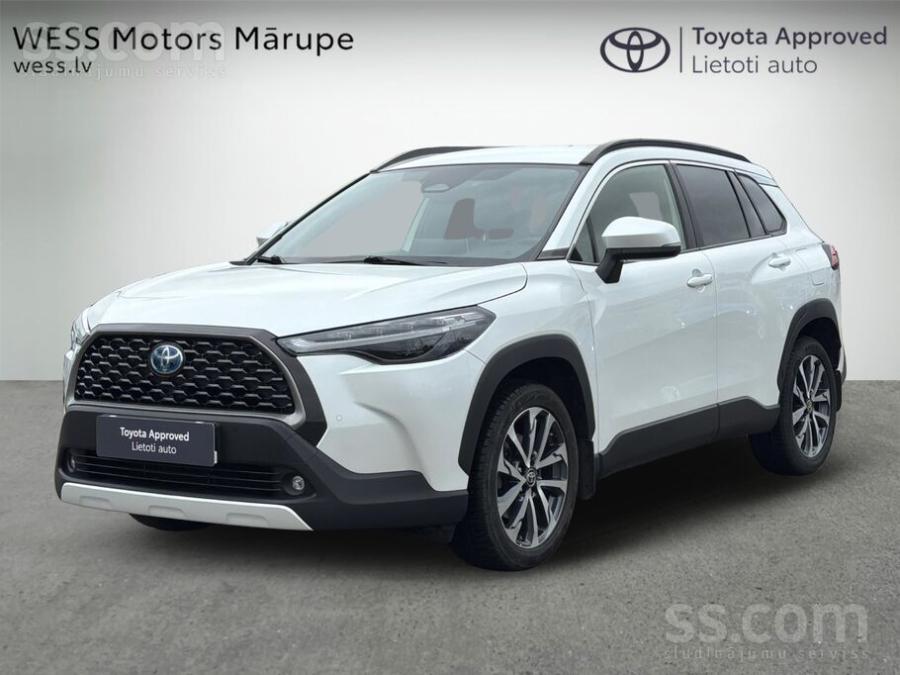 Белый Тойота Corolla Cross 2023 в Рига, объемом двигателя 2.00 л и пробегом 59 тыс. км за 29990 €, фото 1 на AUTOMOTO.COM.LV