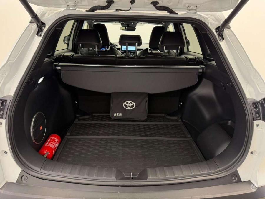 Белый Тойота Corolla Cross 2023 в Паневежис, объемом двигателя 1.99 л и пробегом 119 тыс. км за 30990 €, фото 14 на AUTOMOTO.COM.LV