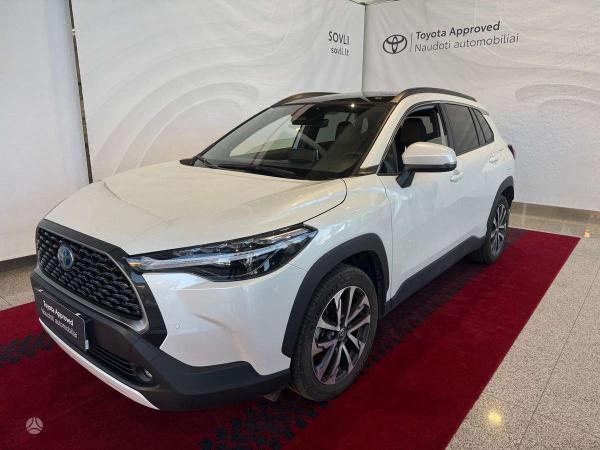 Balts Toyota Corolla Cross 2023 Šauļi, ar dzinēja tilpumu 1.99 L un nobraukumu 51 tūkst. km par 32900 €, foto 1 vietnē AUTOMOTO.COM.LV
