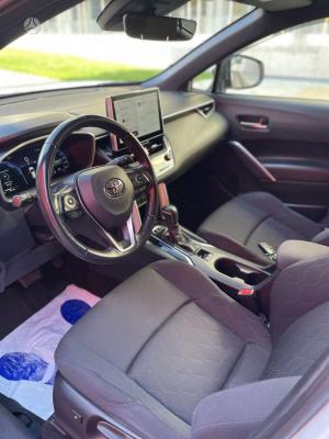 Белый Тойота Corolla Cross 2023 в Вильнюс, объемом двигателя 1.80 л и пробегом 185 тыс. км за 20900 €, фото 11 на AUTOMOTO.COM.LV