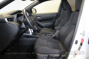White Toyota Corolla Cross 2023 in Tallinn, with an engine capacity of 1.80 L and mileage of 102 thousand km for 25990 €, photo 12 on AUTOMOTO.COM.LV