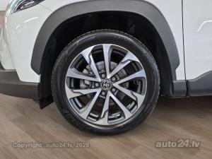 Белый Тойота Corolla Cross 2023 в Таллин, объемом двигателя 1.80 л и пробегом 91 тыс. км за 28490 €, фото 16 на AUTOMOTO.COM.LV