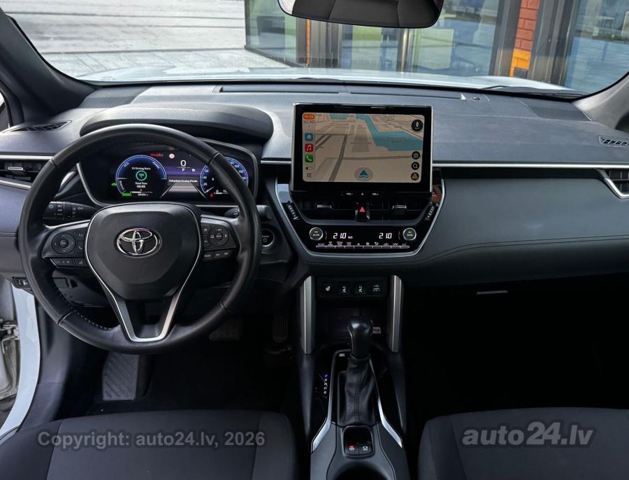 Белый Тойота Corolla Cross 2023 в Таллин, объемом двигателя 1.80 л и пробегом 29 тыс. км за 28500 €, фото 15 на AUTOMOTO.COM.LV