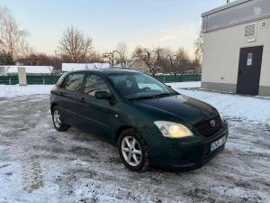 Green Toyota Corolla 2002 in Vilnius, with an engine capacity of 2.00 L and mileage of 239 thousand km for 1050 €, photo  on AUTOMOTO.COM.LV