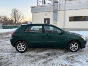 Green Toyota Corolla 2002 in Vilnius, with an engine capacity of 2.00 L and mileage of 239 thousand km for 1050 €, photo 2 on AUTOMOTO.COM.LV