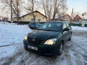 Green Toyota Corolla 2002 in Vilnius, with an engine capacity of 2.00 L and mileage of 239 thousand km for 1050 €, photo 6 on AUTOMOTO.COM.LV