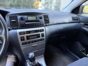 Green Toyota Corolla 2002 in Radviliskis, with an engine capacity of 2.00 L and mileage of 437 thousand km for 1000 €, photo 8 on AUTOMOTO.COM.LV