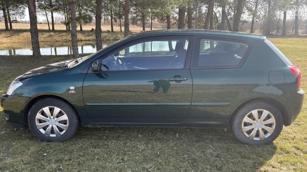 Zaļš Toyota Corolla 2003 Anykščiai, ar dzinēja tilpumu 2.00 L un nobraukumu 202 tūkst. km par 1150 €, foto 4 vietnē AUTOMOTO.COM.LV