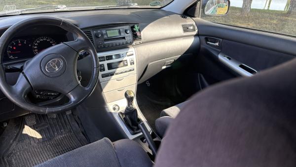 Zaļš Toyota Corolla 2003 Anykščiai, ar dzinēja tilpumu 2.00 L un nobraukumu 202 tūkst. km par 1150 €, foto 5 vietnē AUTOMOTO.COM.LV